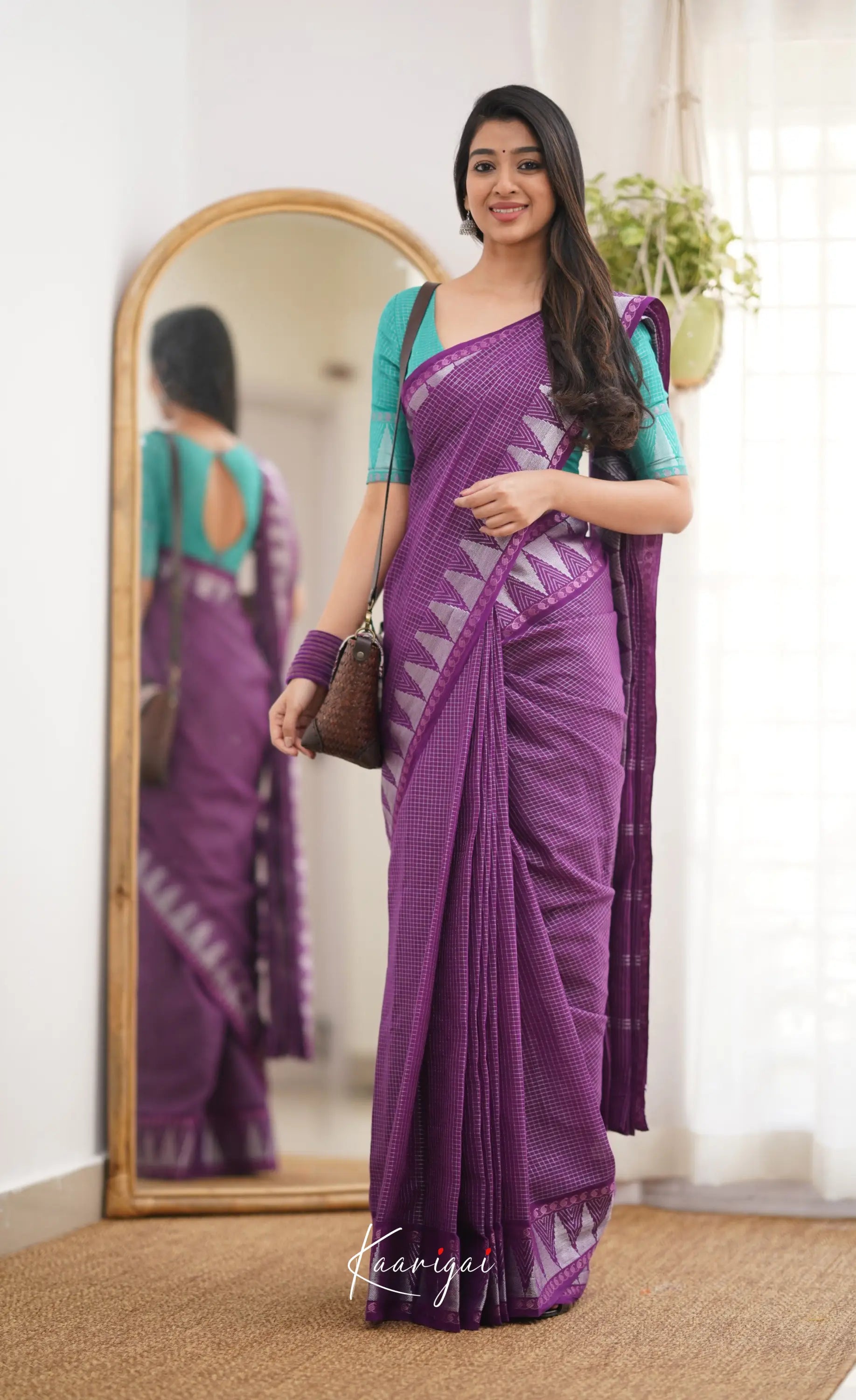 Saaral Dark Purple shade and Teal Green tone Sungudi Saree – Ivalinmabia